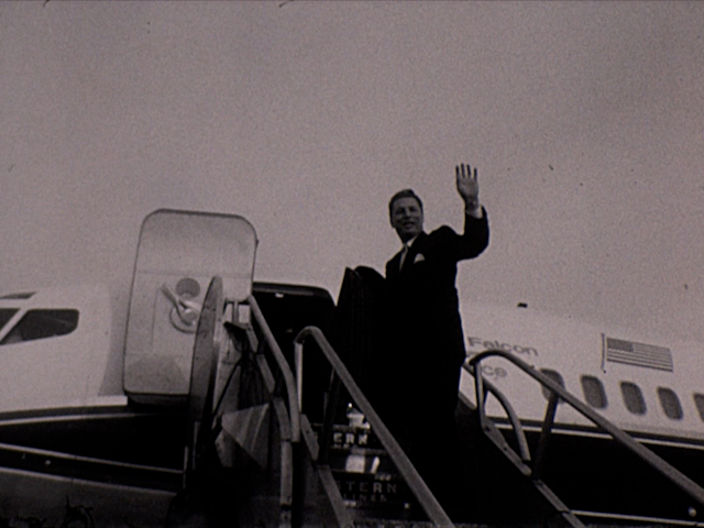 Singer Howard Hartman Boards Plane (1963) - KPRC-TV Collection
